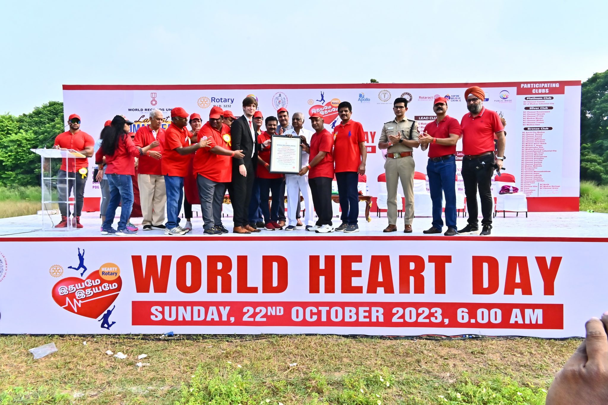 Largest human image of a love heart symbol and making heart gesture ...